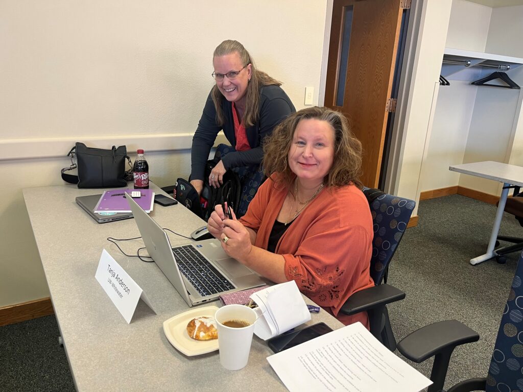 2024_10_18 Tanja Anderson of WTW and another rep standing at left | UW ...